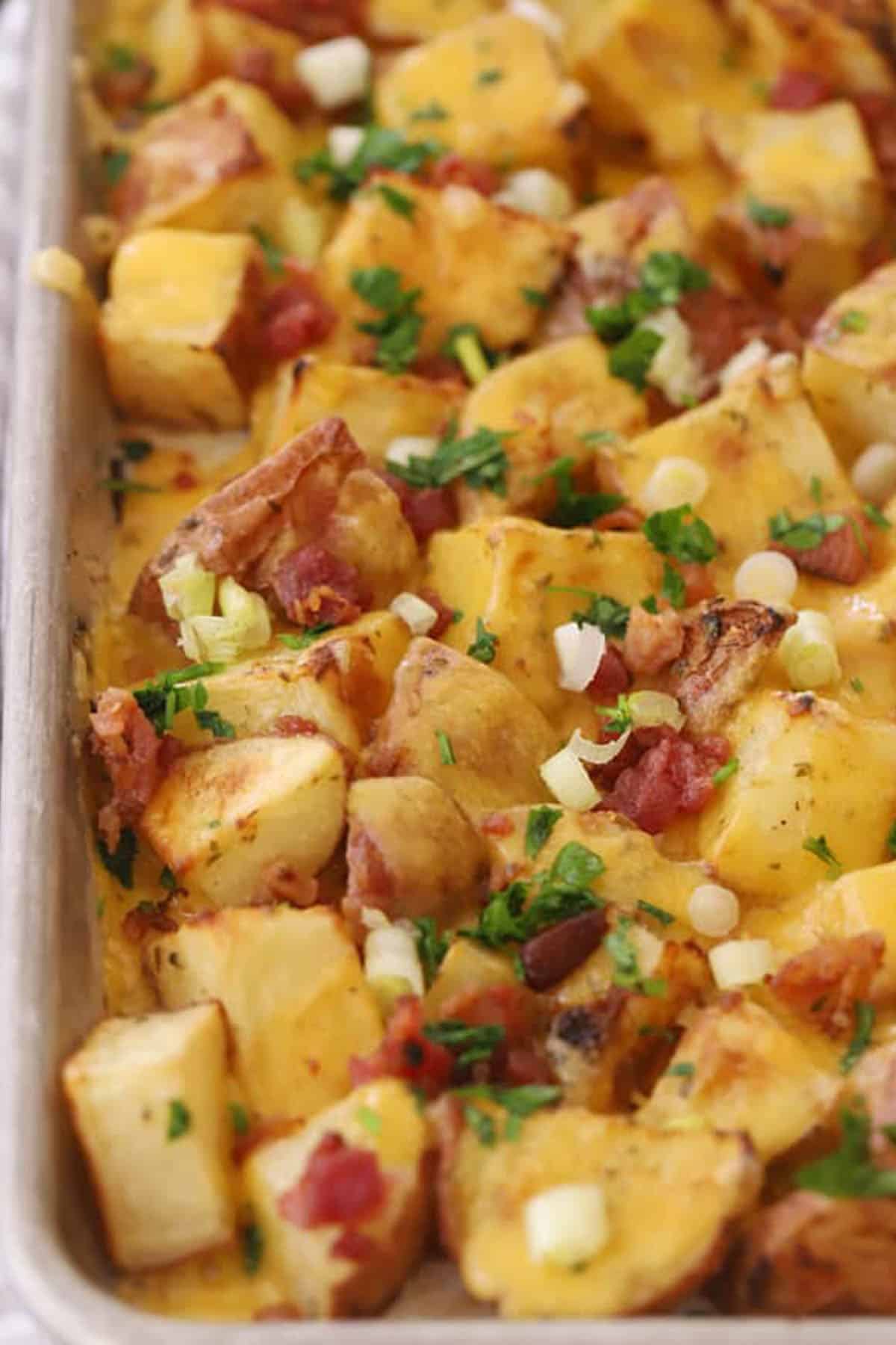 Garlic Herb Cheesy Roasted Potatoes - The Carefree Kitchen